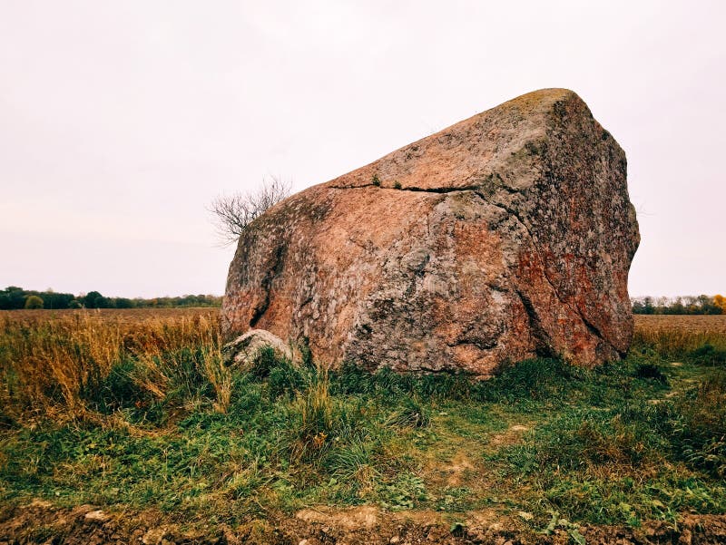 An ancient boulder stock image. Image of outdoor, middle - 199012839
