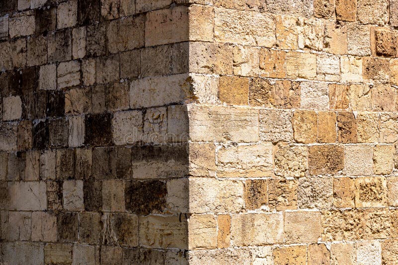 Ancient Brick Wall Corner with a Half Illuminated by the Sun Half is in ...