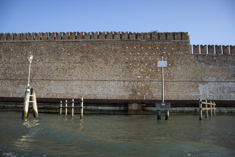 An Ancient Brick Wall of Red Brick in the Light in the Sea with by the ...