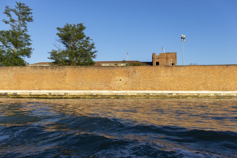 An Ancient Brick Wall of Red Brick in the Light in the Sea with by the ...