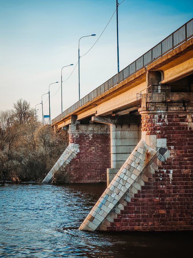 Ancient Bridge Over the River with Stone Pillars. Rapid Flow of Water ...
