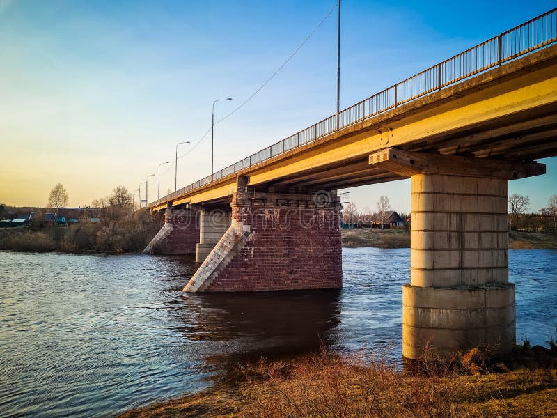 Ancient Bridge Over the River with Stone Pillars. Rapid Flow of Water ...