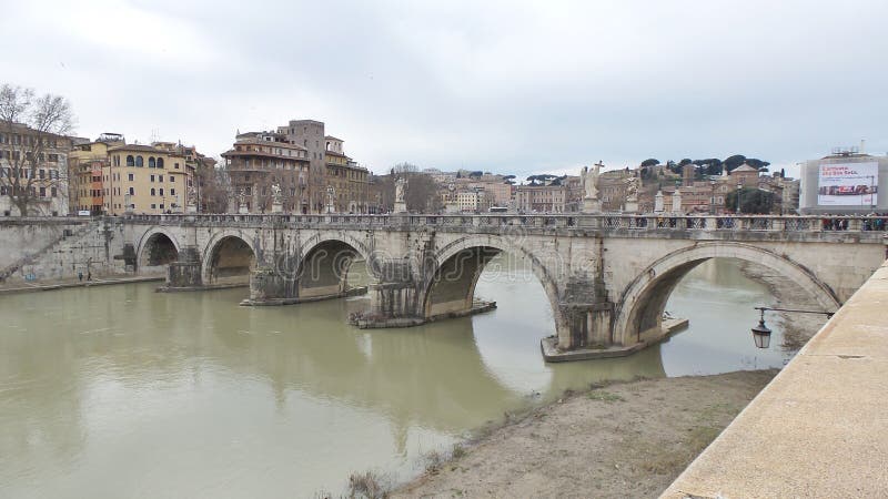 Ancient Bridge on the Tiber River in Rome Stock Image - Image of angel ...