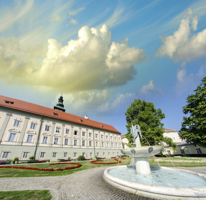 Ancient Building in a Beautiful City Square with Fountain and Tr Stock ...