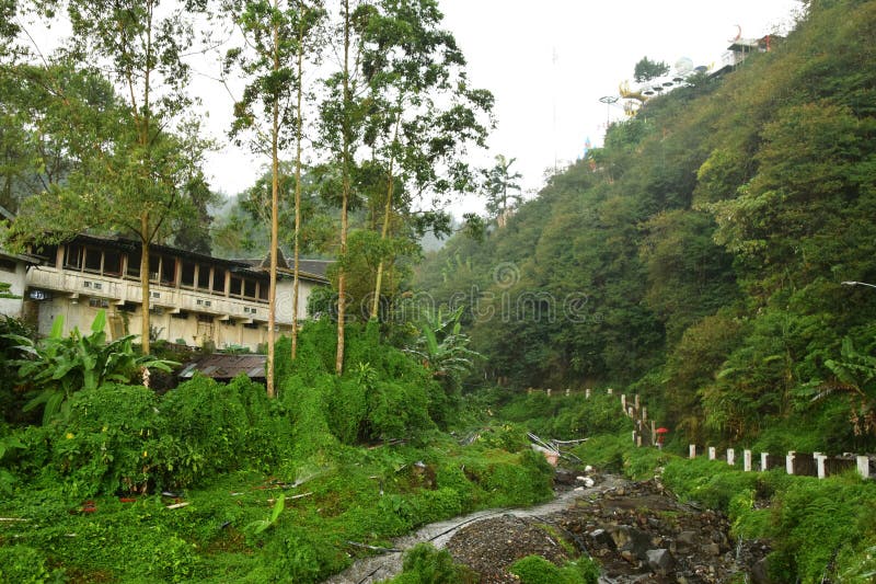 Ancient Building Surrounded by Lush Forest and a Serene River Stock ...