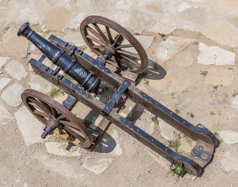 Ancient cannon on wheels stock photo. Image of firearm - 57538280