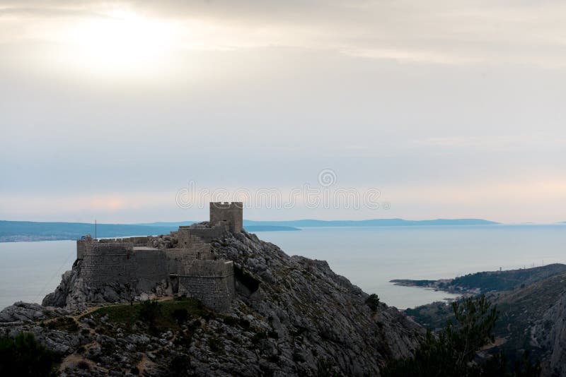 Ancient castle of Omis stock image. Image of europe, clouds - 78525127
