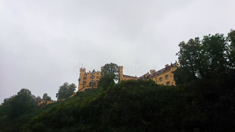 Ancient Castle on Top of a Hill Covered with Trees Stock Image - Image ...