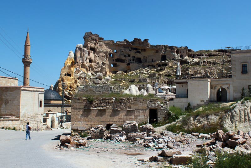 Ancient Cave City of Cavusin in Cappadocia, Turkey Stock Photo - Image ...