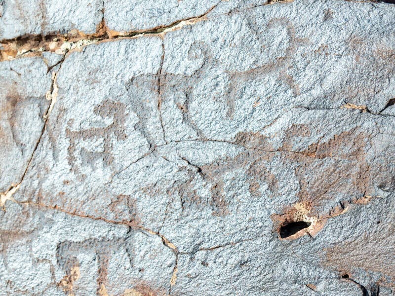 Ancient Cave Paintings. Petroglyphs in the Wild. Stock Image - Image of ...