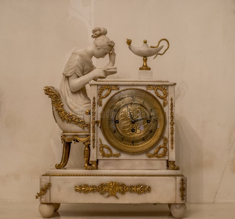 Ancient Clocks with Reading Lady Stock Photo - Image of ancient ...