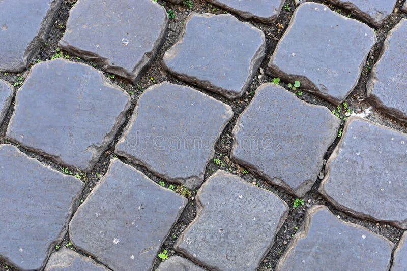 Ancient cobblestone Rome stock image. Image of italy - 242357935