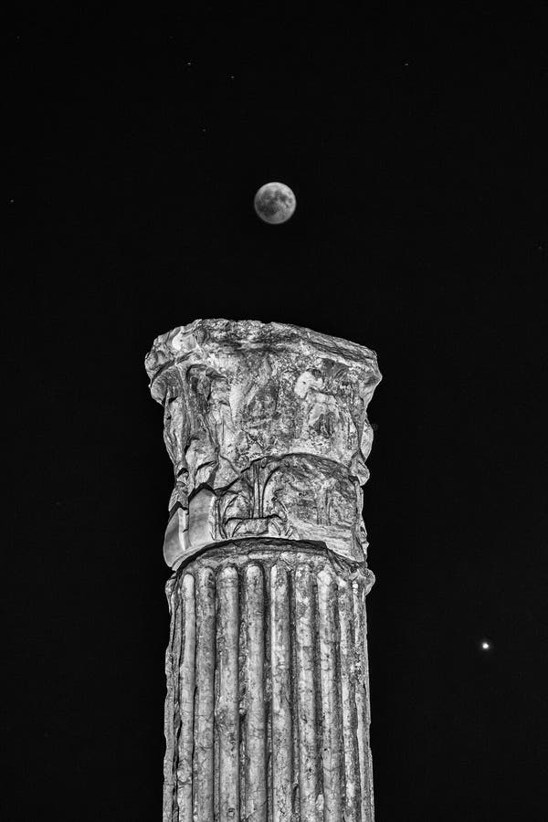 Ancient Column with Engravings Under a Full Moon during the Night Stock ...