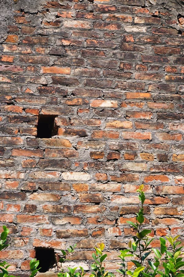 Rough Brick Wall with Pattern of Protruding Bricks Stock Photo - Image ...
