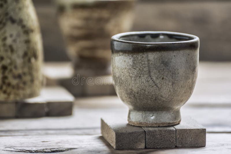 Ancient Cups of Tea on Wooden Table. Stock Image - Image of orange ...