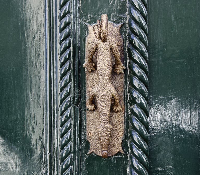 Ancient door knocker stock photo. Image of green, lizard - 26205106
