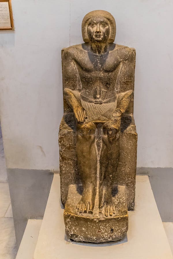 Ancient Egyptian Statue of a Seated Man Editorial Stock Image - Image ...