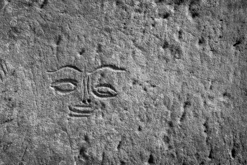 Ancient Engraving of the Face on a Stone Wall Stock Image - Image of ...