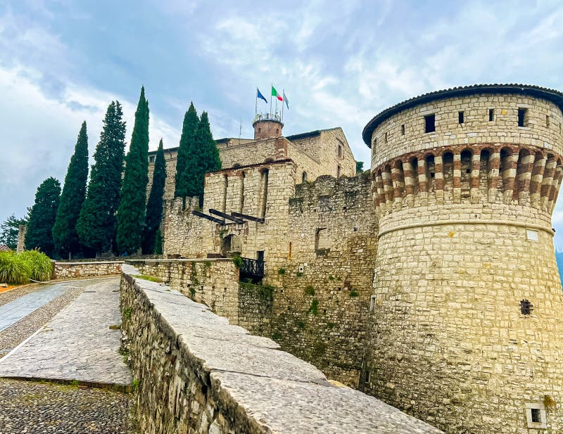 Ancient European Castle with Round Tower and Walkway Along the Top of ...