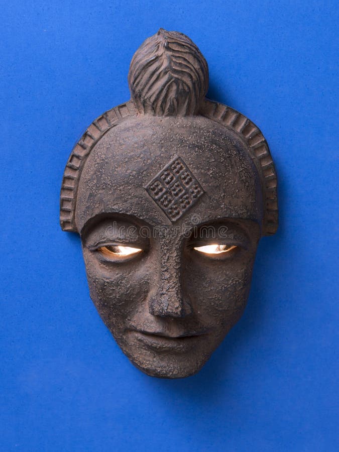 Ancient Face with Glowing Eyes Stock Image - Image of polynesian ...