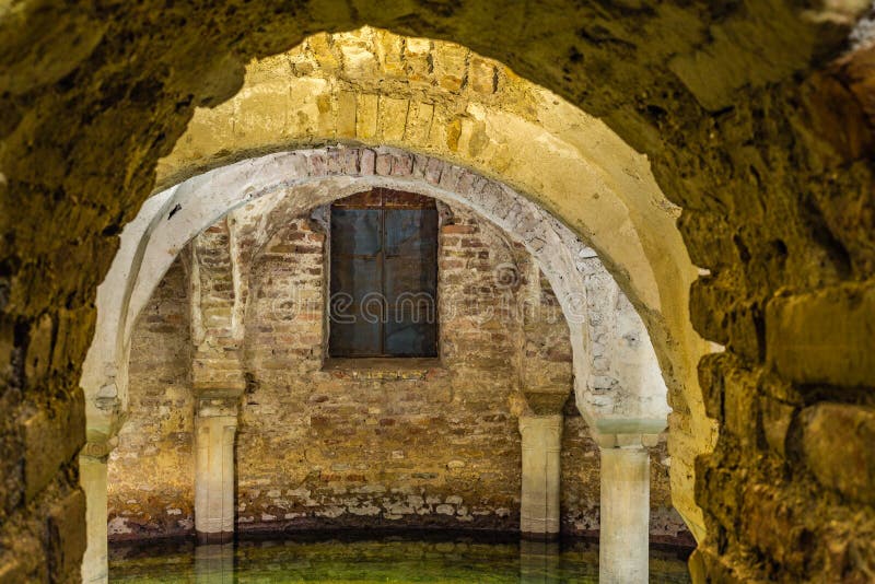 Ancient flooded crypt stock image. Image of arch, floor - 83971269