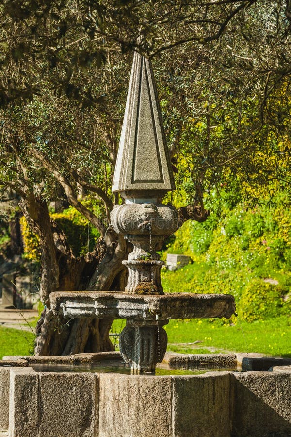 Ancient fountain stock image. Image of statue, landmark - 365580919