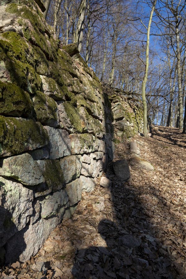 Ancient Fragments of Rock Wall in the Forest Protecting Road from ...