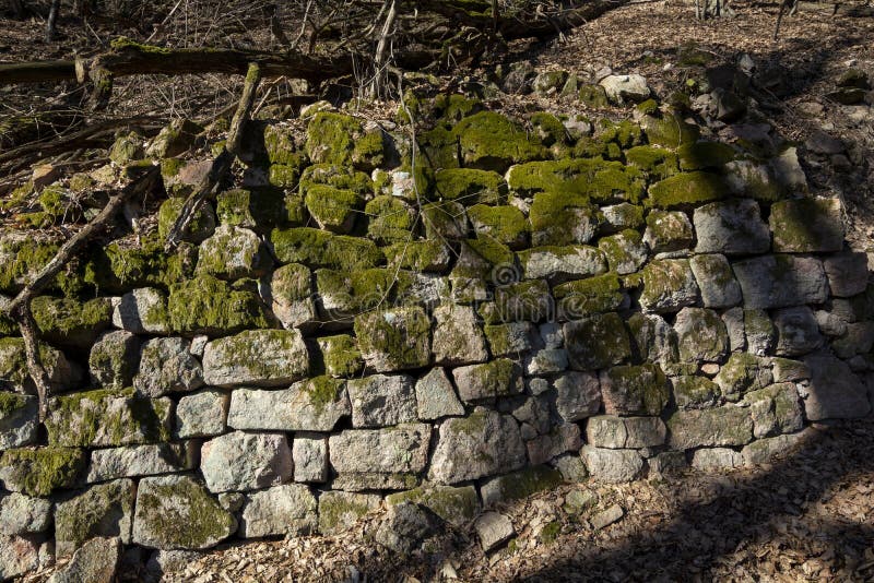 Ancient Fragments of Rock Wall in the Forest Protecting Road from ...
