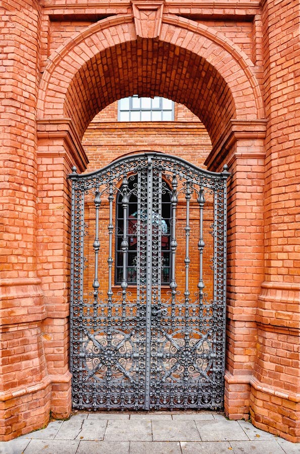 Ancient Gate in Red Brick Arch Stock Photo - Image of gates, iron ...