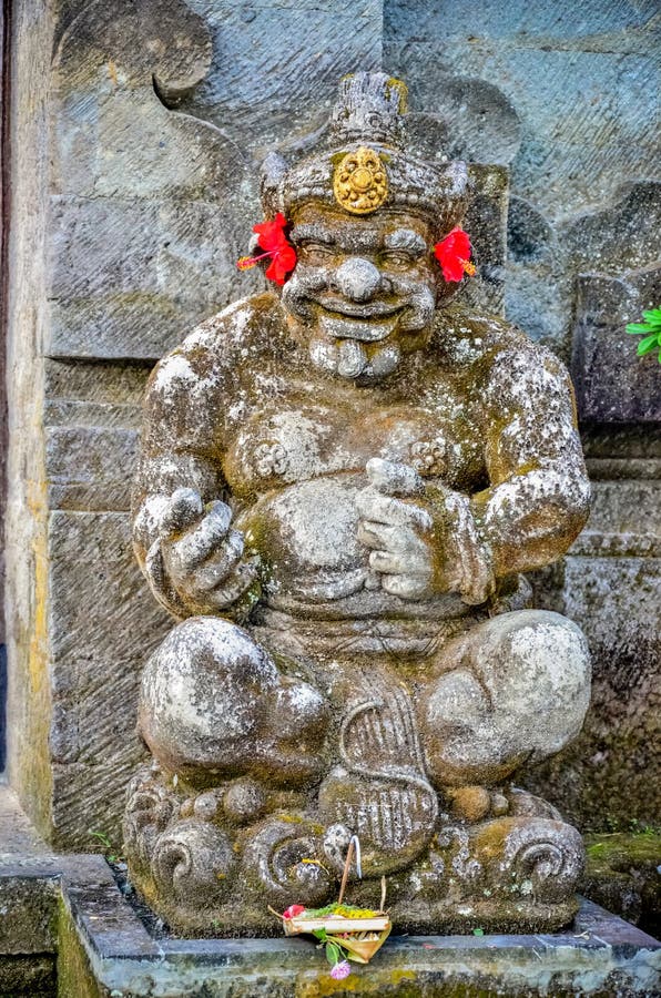 Ancient God Statues with Smile at Bali Stock Image - Image of cement ...