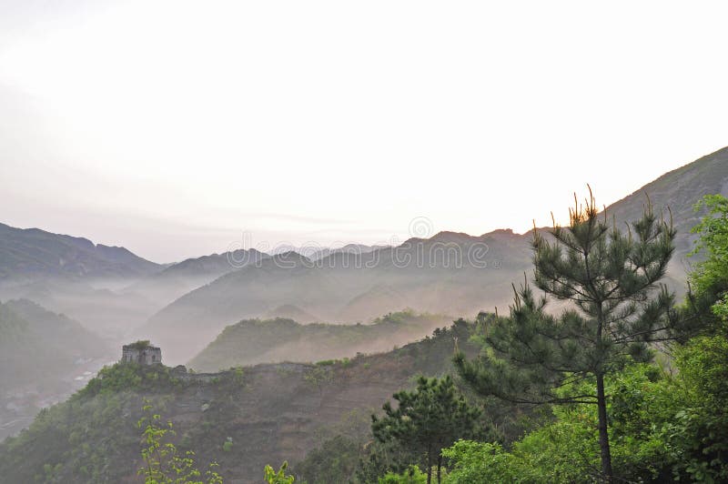 The Ancient Great Wall and the Early Morning Mist Stock Image - Image ...