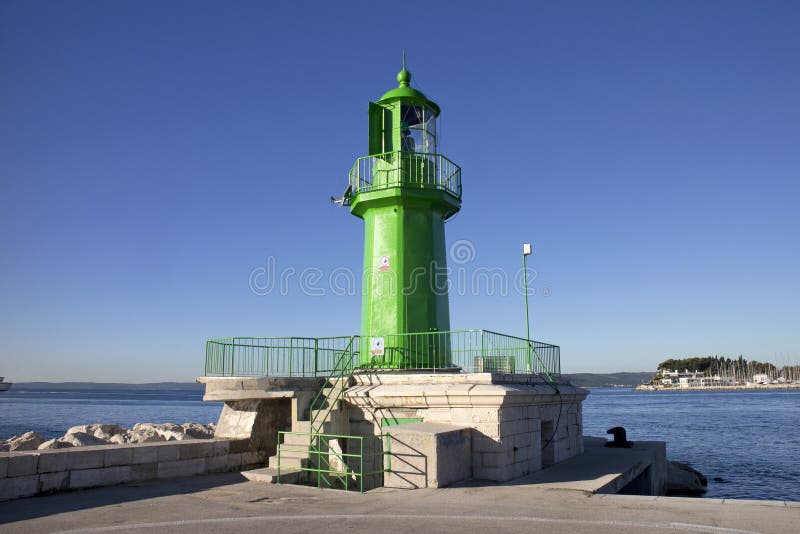 Ancient green lighthouse stock photo. Image of marine - 54118024