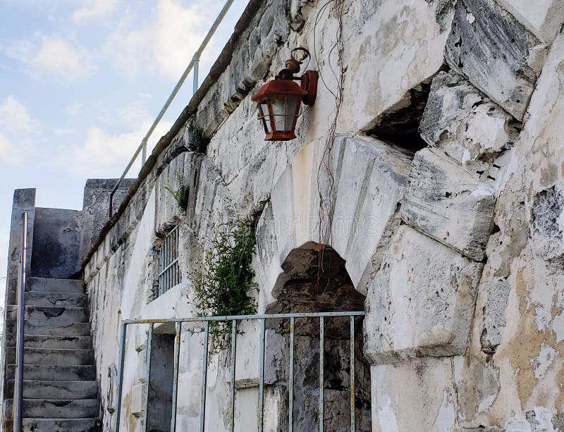 Ancient Holding Cells with Red Lamp and Steel Bars Stock Image - Image ...