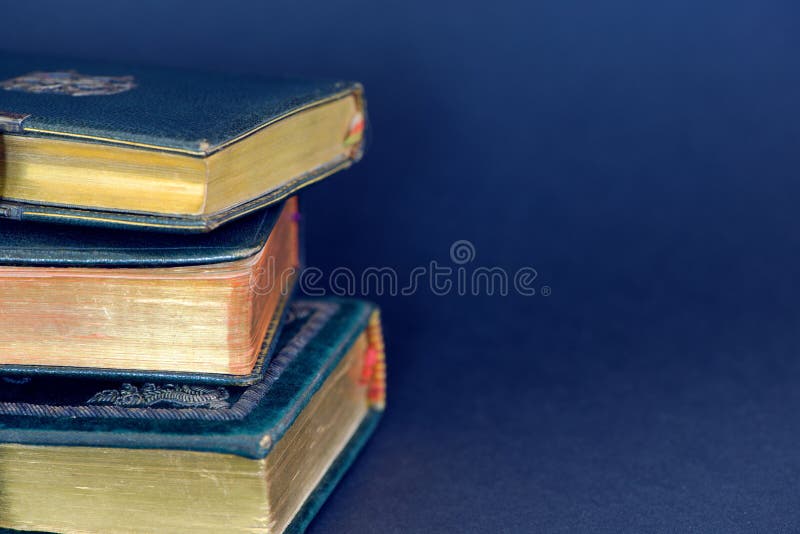 Ancient Holy Bibles Against Blue Background Stock Photo - Image of blue ...