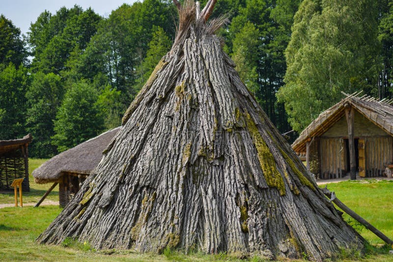 An Ancient Hut Built from Tree Bark Stock Image - Image of grey, jungle ...