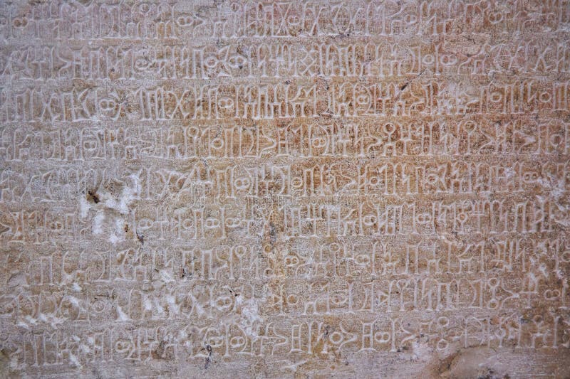 Ancient Inscriptions on Stone, Close-up. Historical Research Stock ...