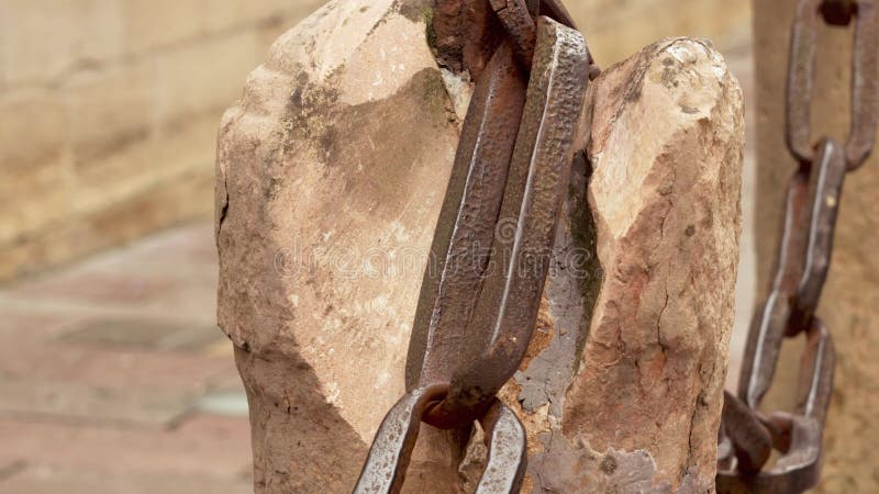 Ancient Iron Chain with Whole Links on Antique Stone Post Close-up ...
