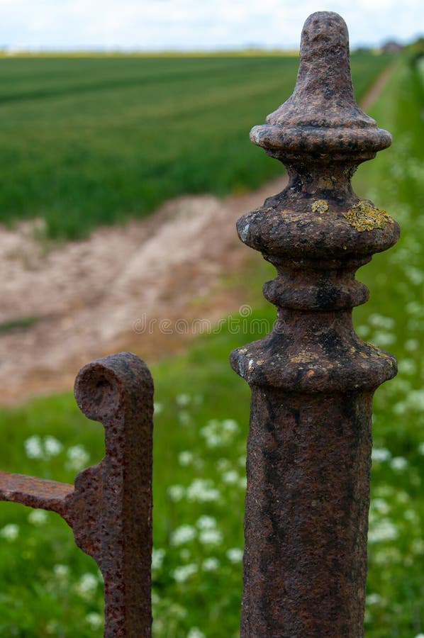 Ancient Iron Gate Post To Field Stock Photo - Image of post, wall ...