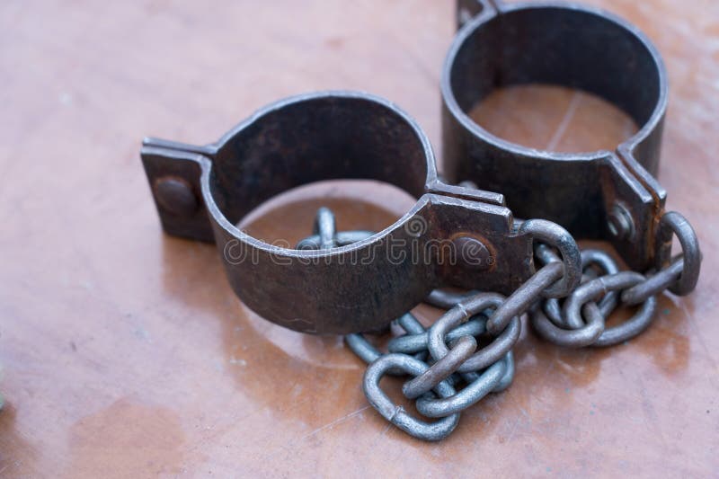 Ancient Iron Shackles of a Slave with a Chain Stock Photo - Image of ...