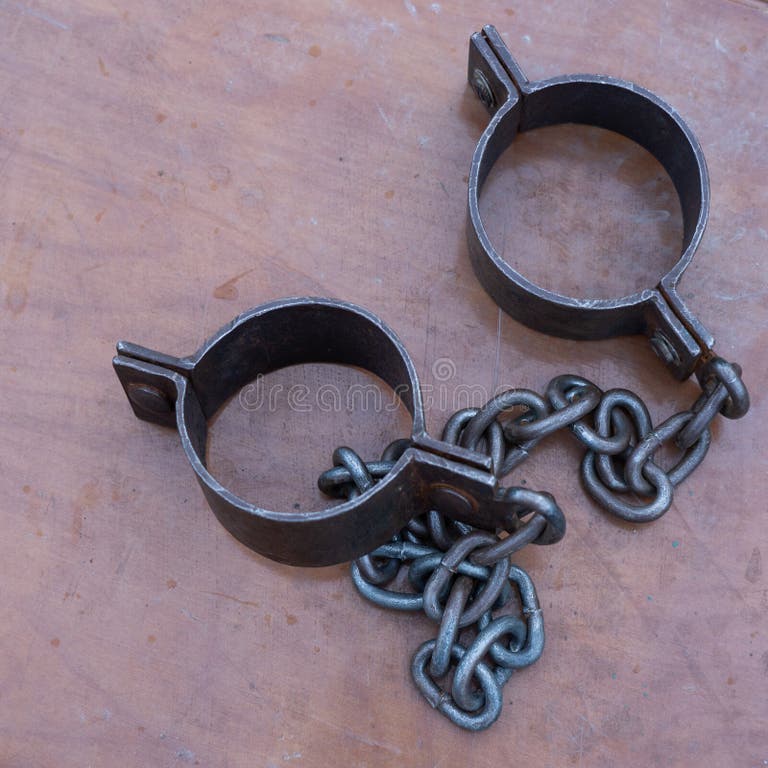 Ancient Iron Shackles of a Slave with a Chain Stock Photo - Image of ...