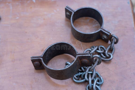 Ancient Iron Shackles of a Slave with a Chain Stock Image - Image of ...