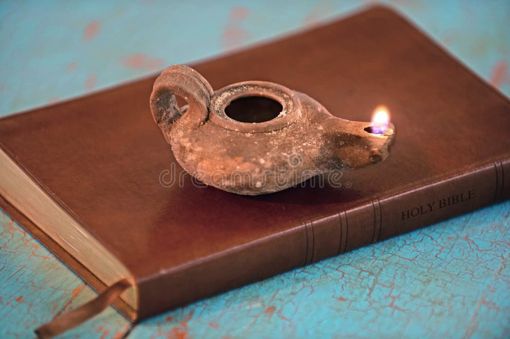 Ancient Lamp on Bible stock photo. Image of light, antique - 40165770