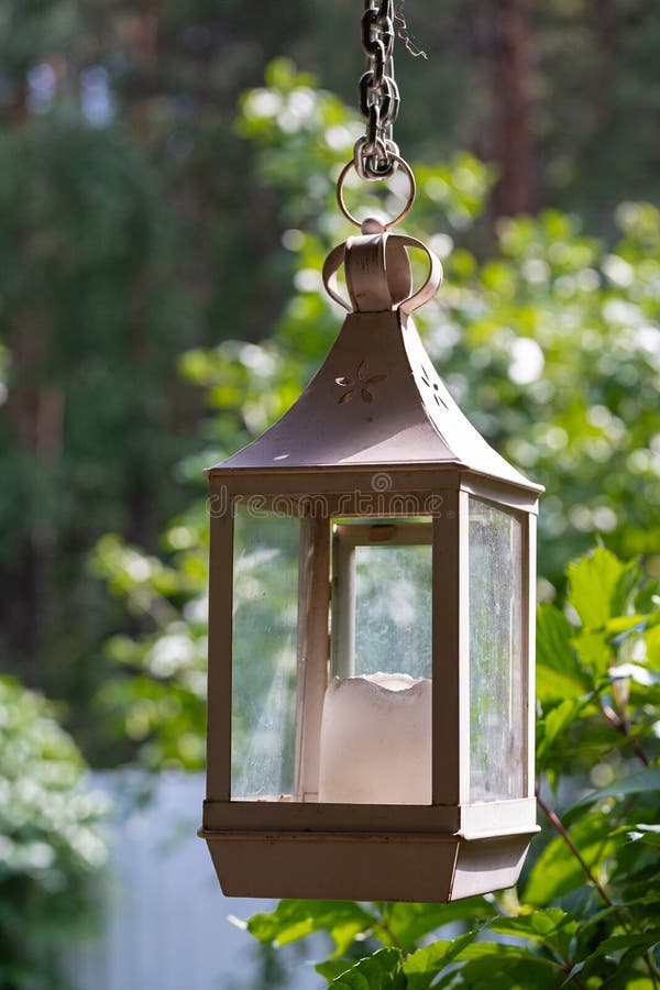 Ancient lamp with candle stock image. Image of lantern - 261607933