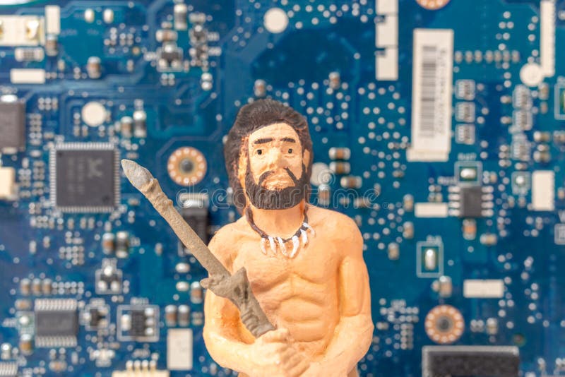 An Ancient Man Standing in Front of a Computer Motherboard Stock Photo ...