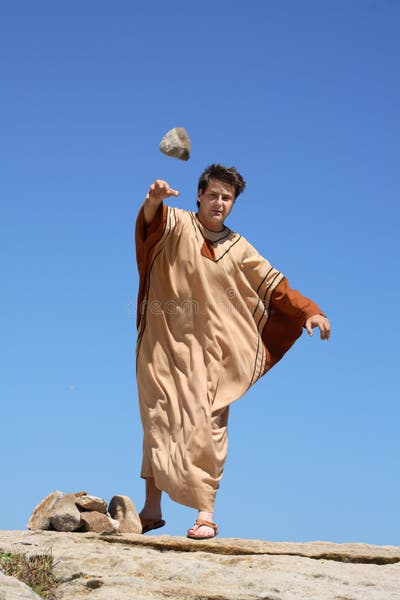 Ancient man throwing stone stock image. Image of throwing - 4028031