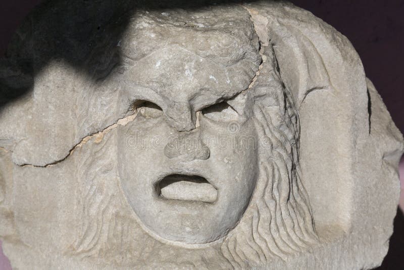 Ancient mask in stone stock photo. Image of stone, detail - 114836376
