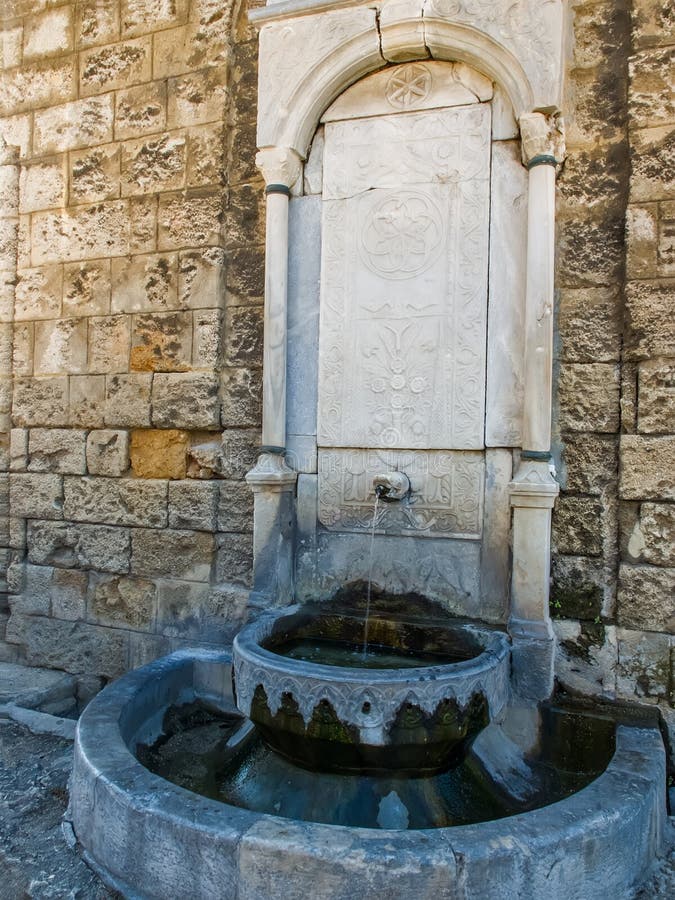 An Ancient Medieval Drinking Fountain Stock Image - Image of mantel ...