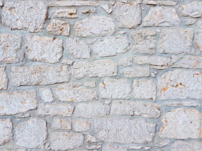 Ancient Medieval Stone Masonry. Texture of a Fragment of a Wall of an ...