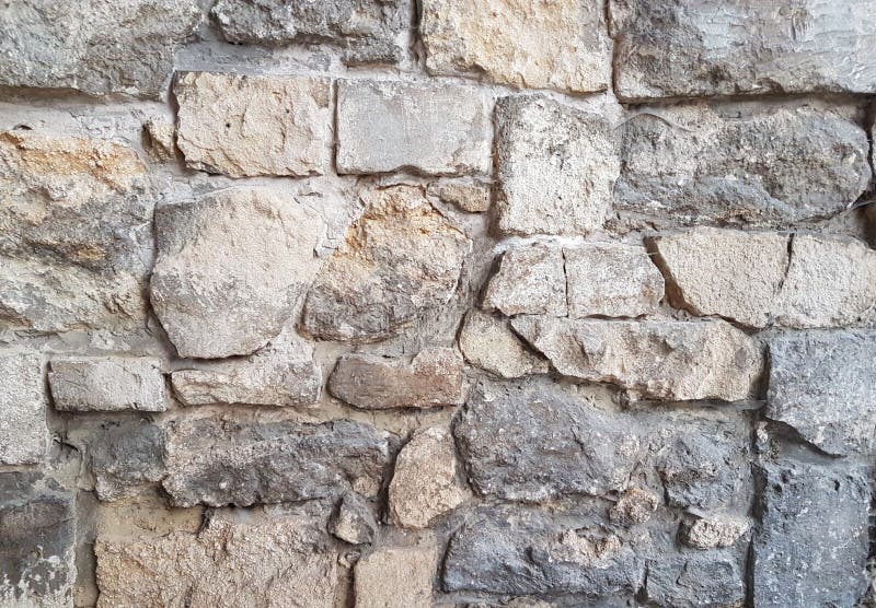Ancient Medieval Stone Masonry. Texture of a Fragment of a Wall of an ...