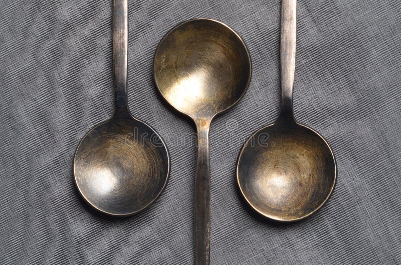 Ancient Metal Tablespoons on Grey Fabric Close-up Stock Image - Image ...
